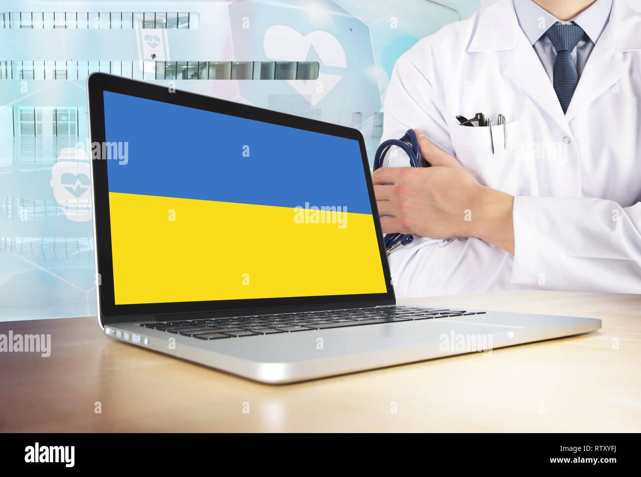Ukraine healthcare system in tech theme. Ukrainian flag on computer ...