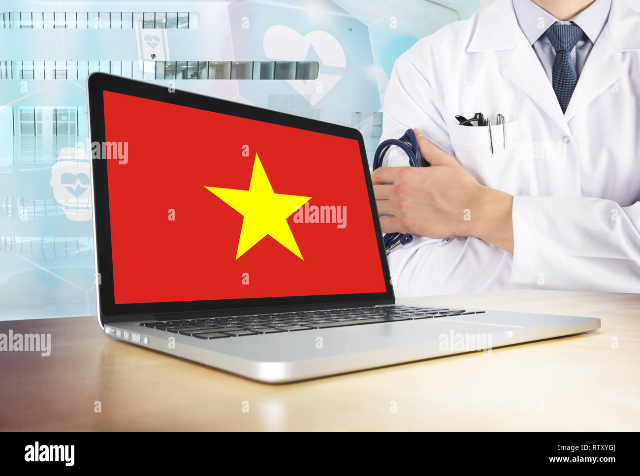 Vietnam healthcare system in tech theme. Vietnamese Flag on computer ...