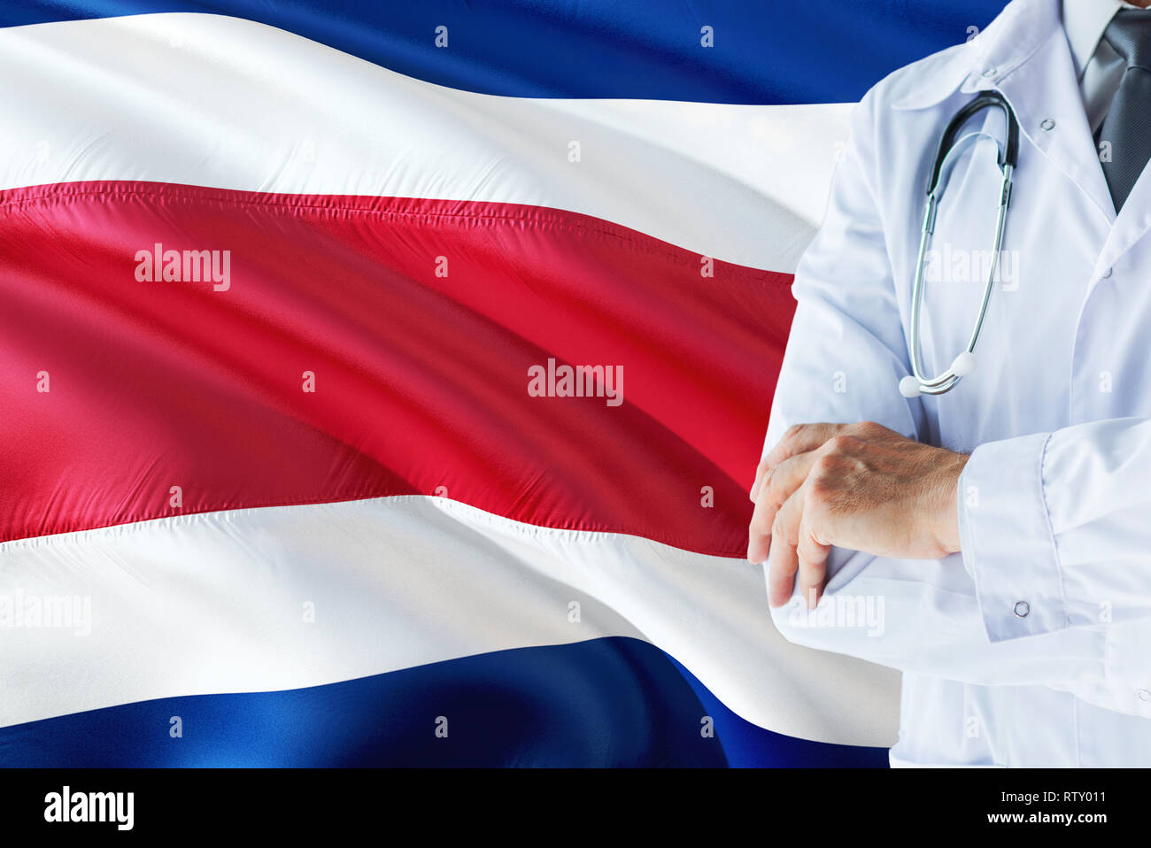 Doctor standing with stethoscope on Costa Rica flag background ...