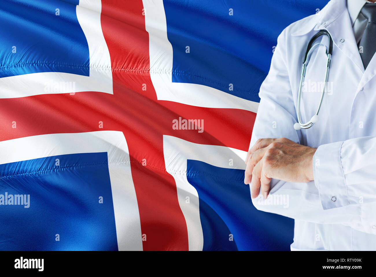 Doctor standing with stethoscope on Iceland flag background. National ...