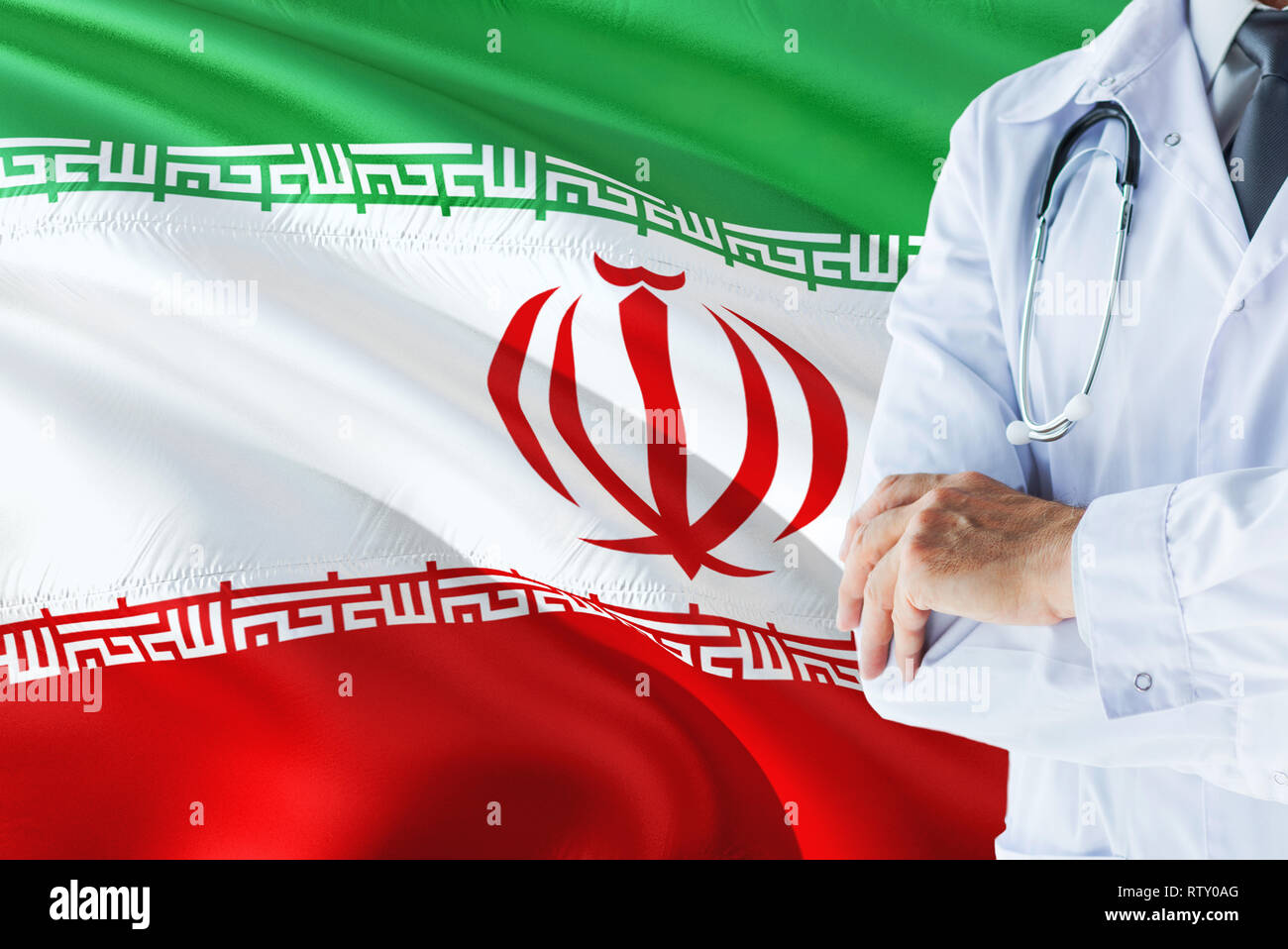 Iranian Doctor standing with stethoscope on Iran flag background ...
