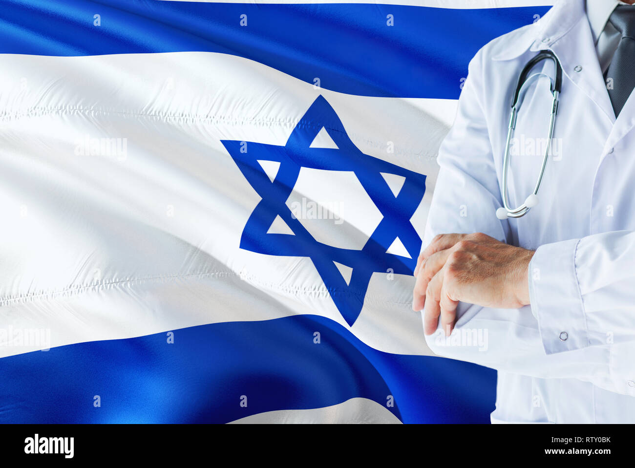Israeli Doctor standing with stethoscope on Israel flag background ...