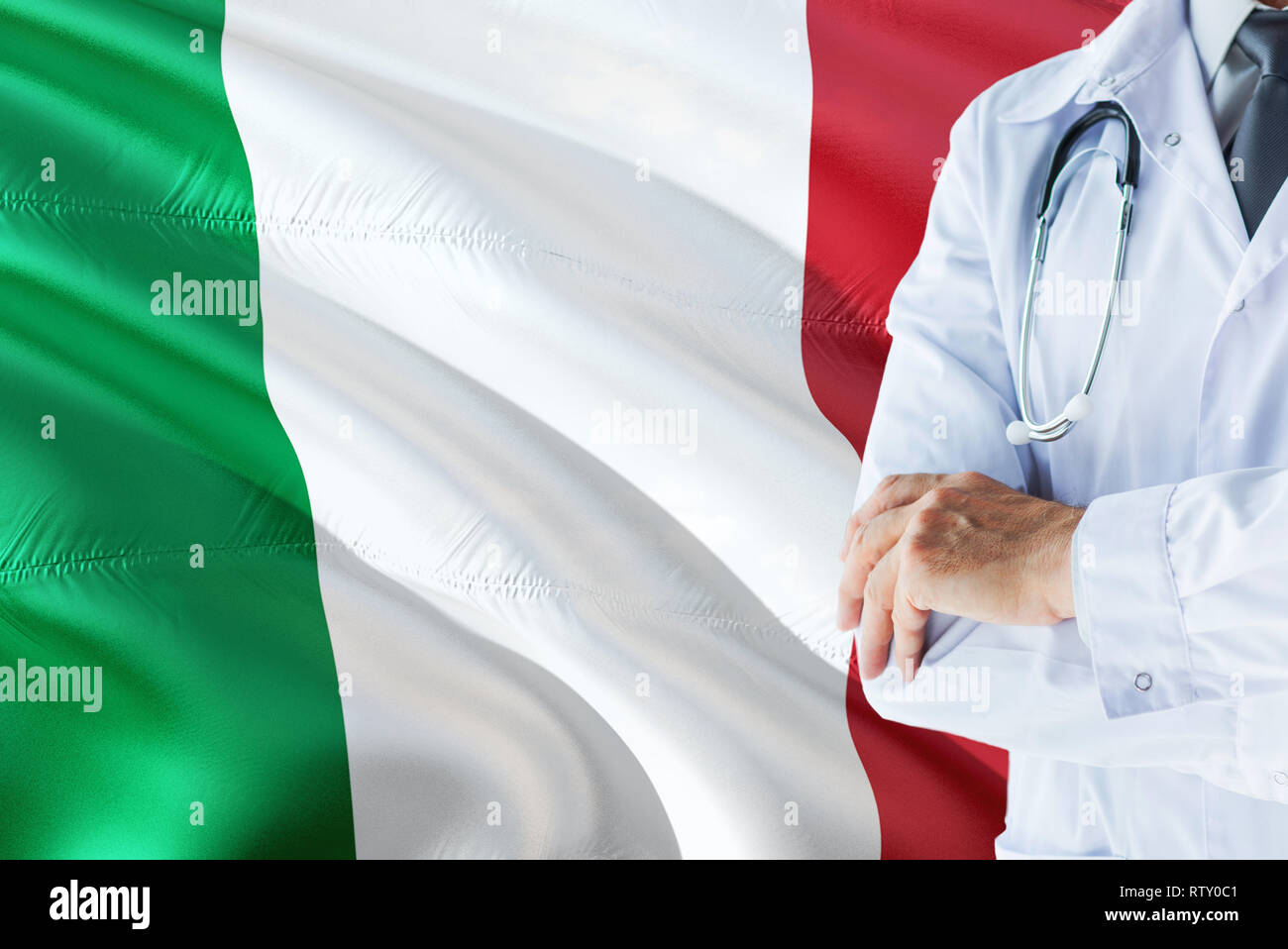 Italian Doctor standing with stethoscope on Italy flag background ...