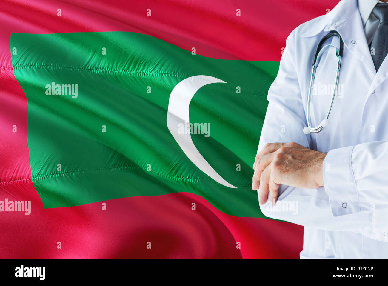 Maldivan Doctor standing with stethoscope on Maldives flag background ...