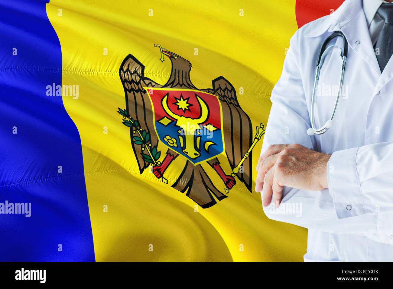 Moldovan Doctor standing with stethoscope on Moldova flag background ...