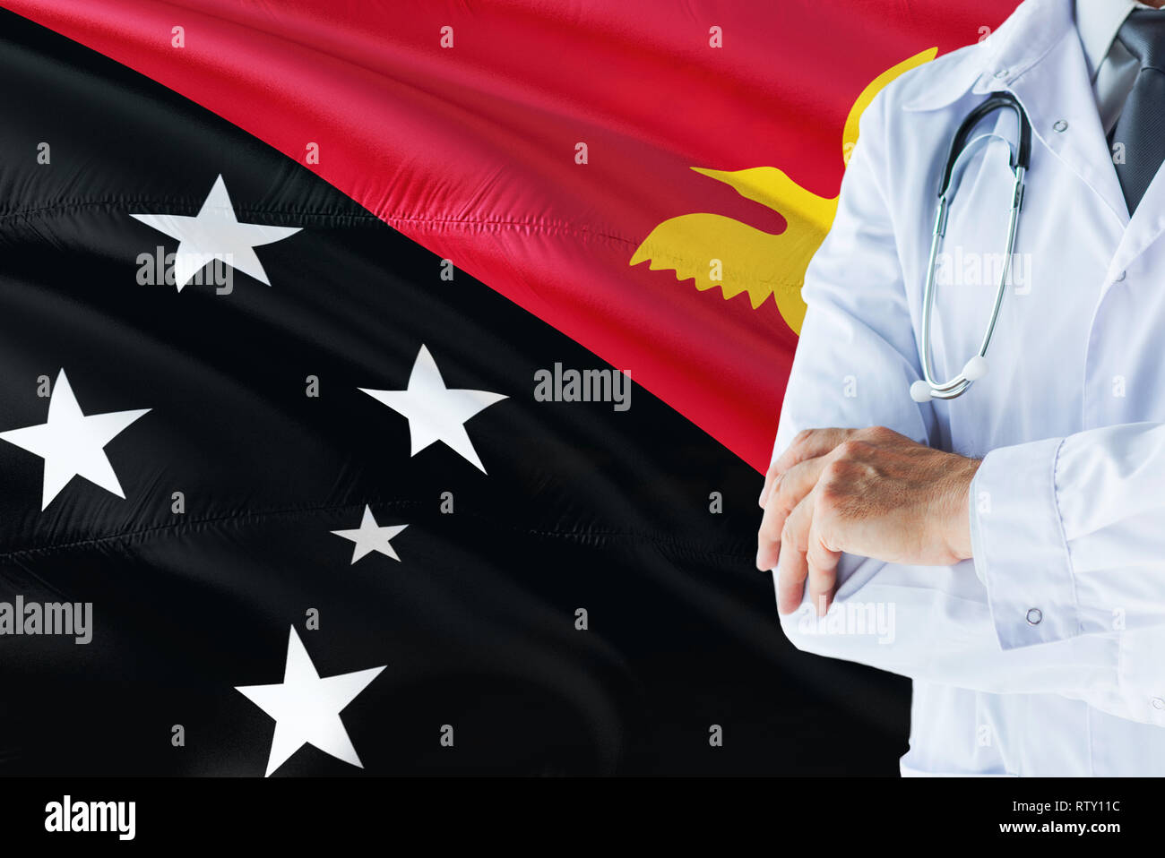 Doctor standing with stethoscope on Papua New Guinea flag background ...