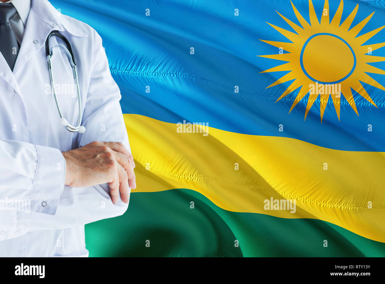 Rwandan Doctor standing with stethoscope on Rwanda flag background ...