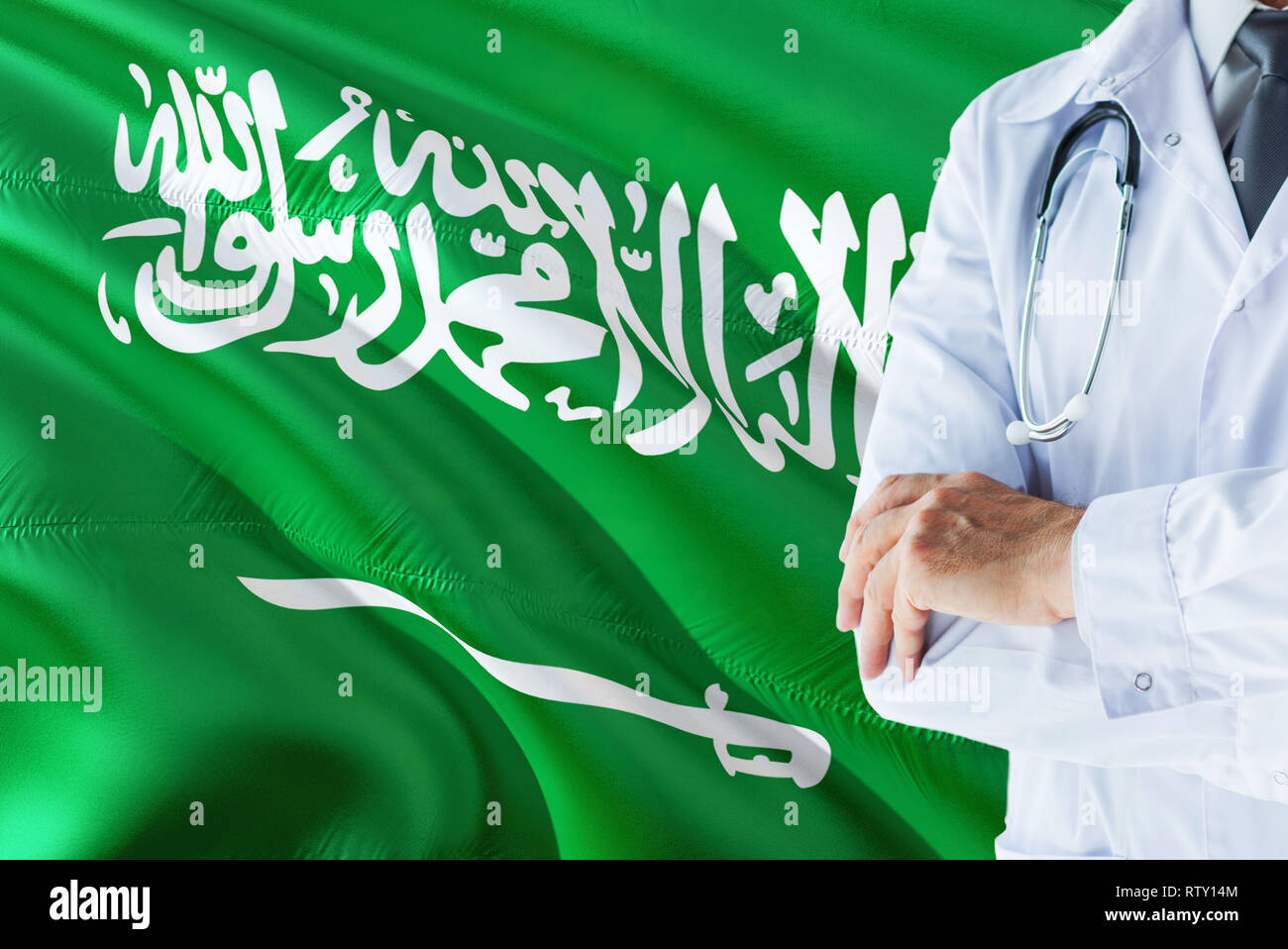 Saudi Doctor standing with stethoscope on Saudi Arabia flag background ...