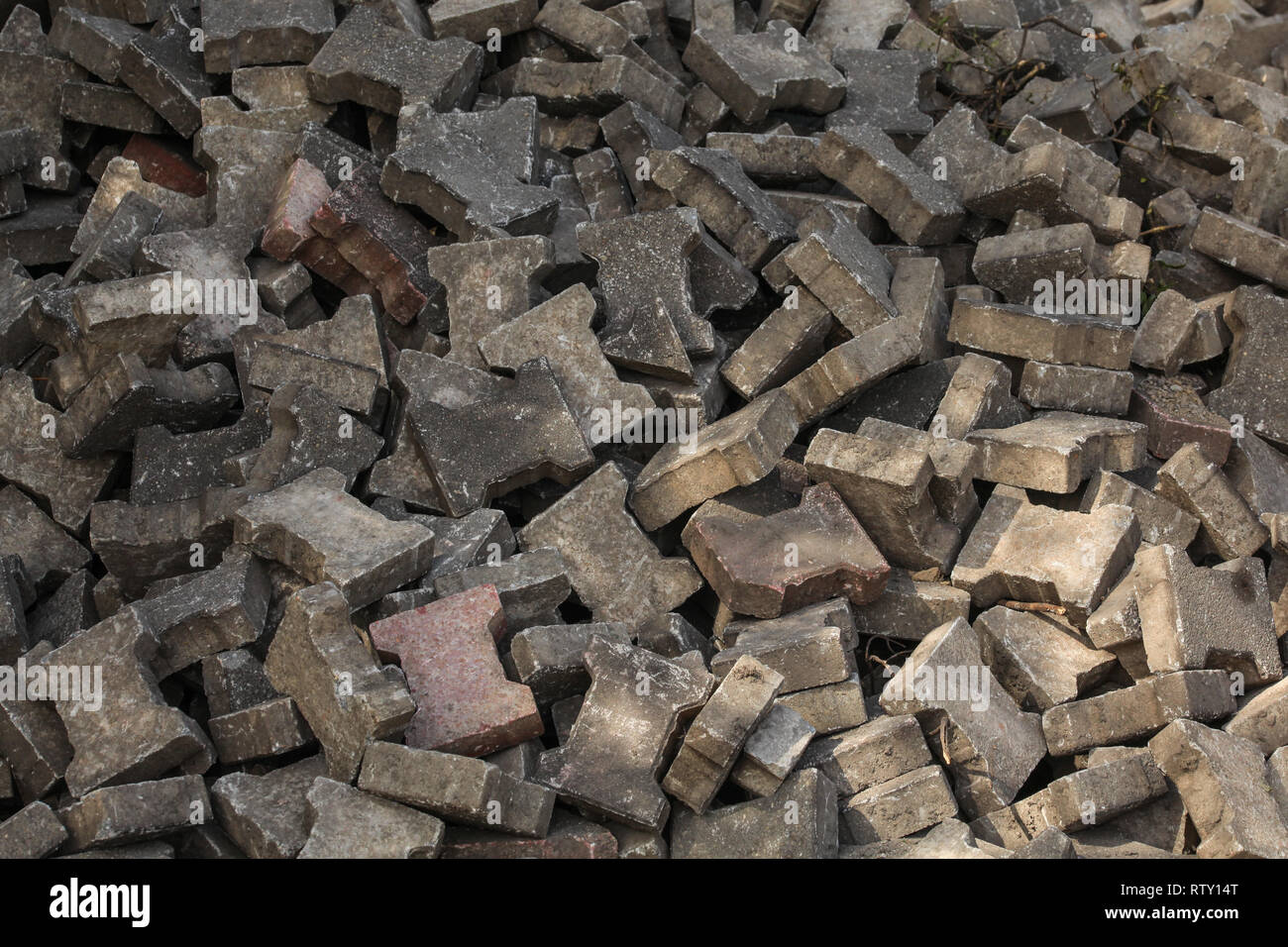 Pile of discarded pavement (segmental paver) cobblestones Stock Photo ...