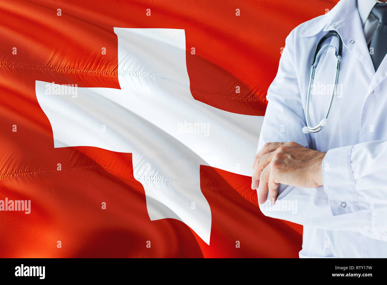 Swedish Doctor standing with stethoscope on Sweden flag background ...