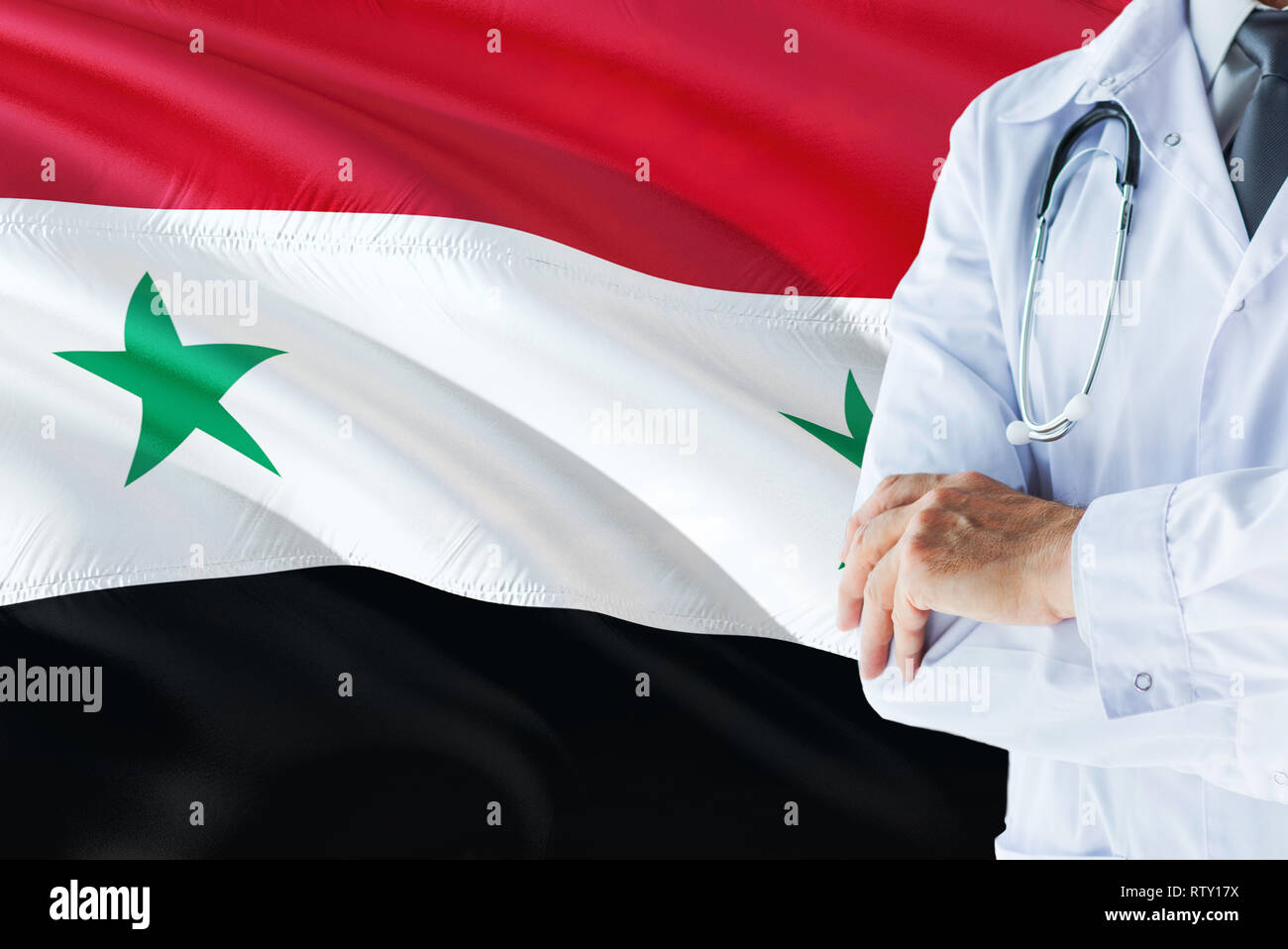 Syrian Doctor standing with stethoscope on Syria flag background ...