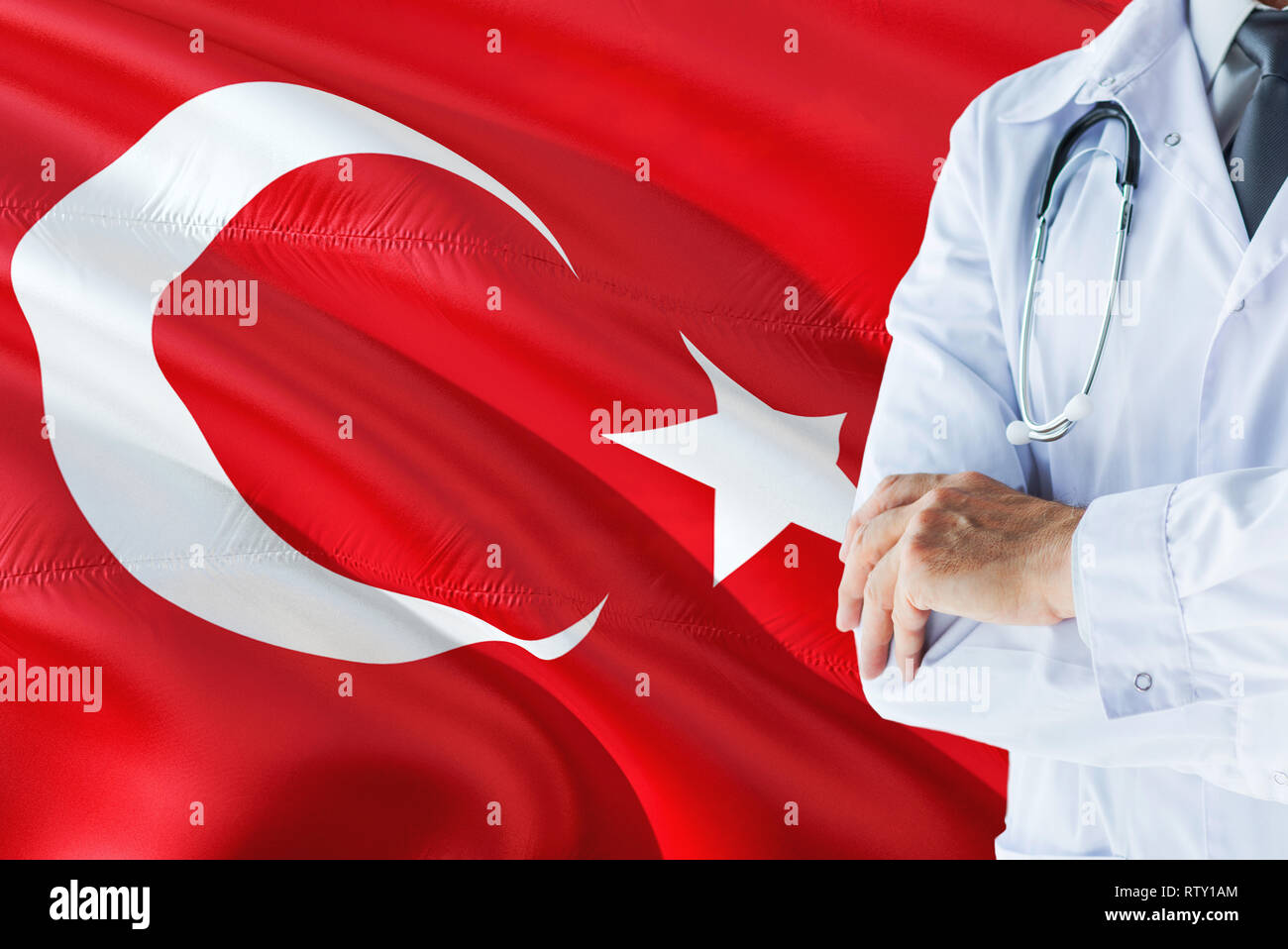 Turkish Doctor standing with stethoscope on Turkey flag background ...