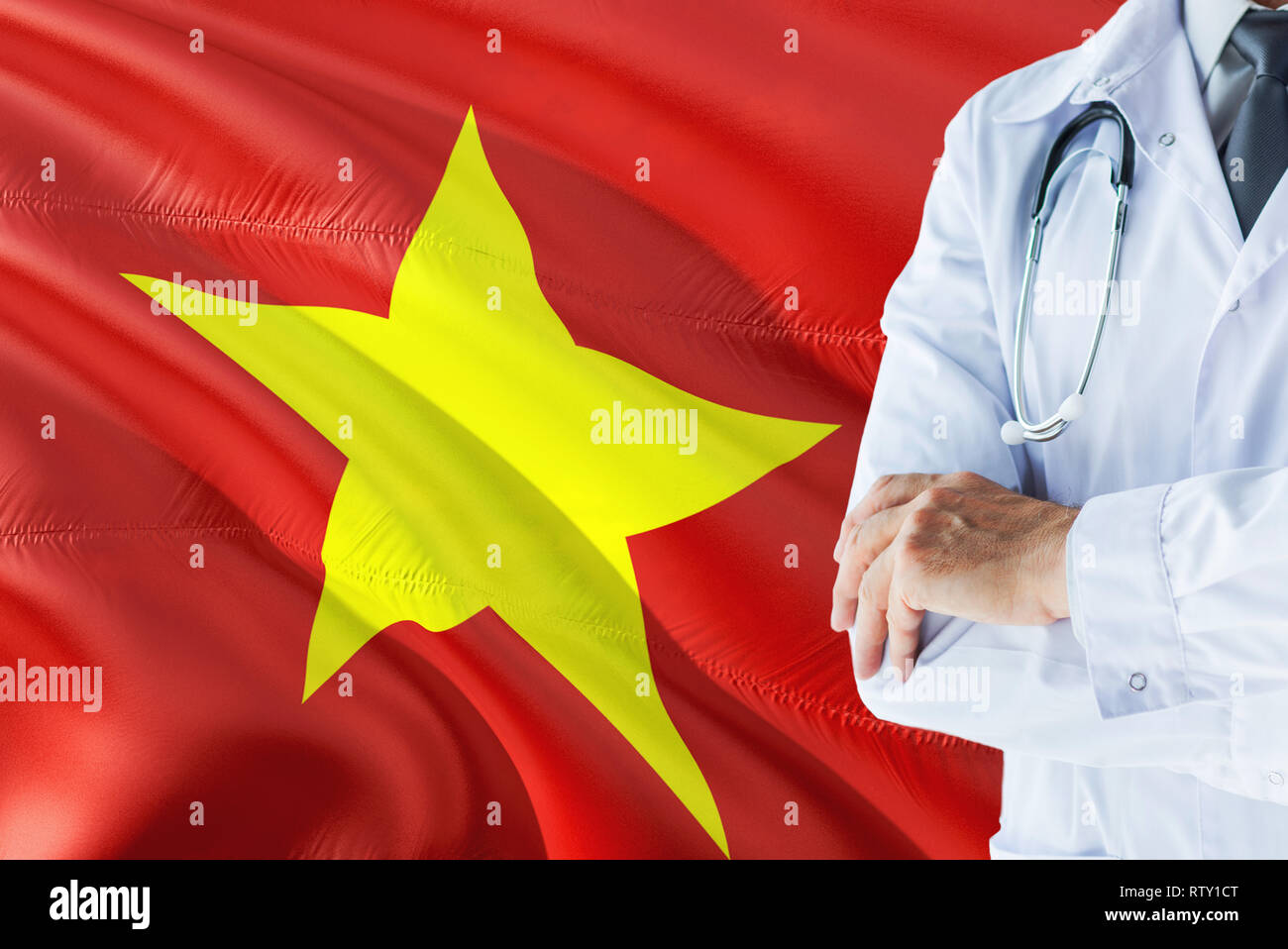 Vietnamese Doctor standing with stethoscope on Vietnam flag background ...