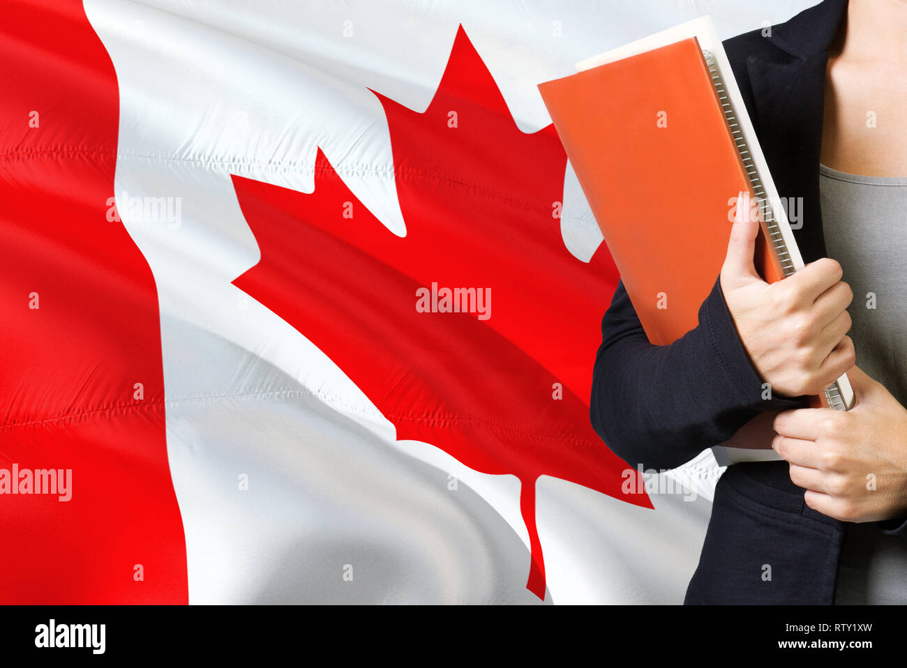 Learning Canadian language concept. Young woman standing with the ...