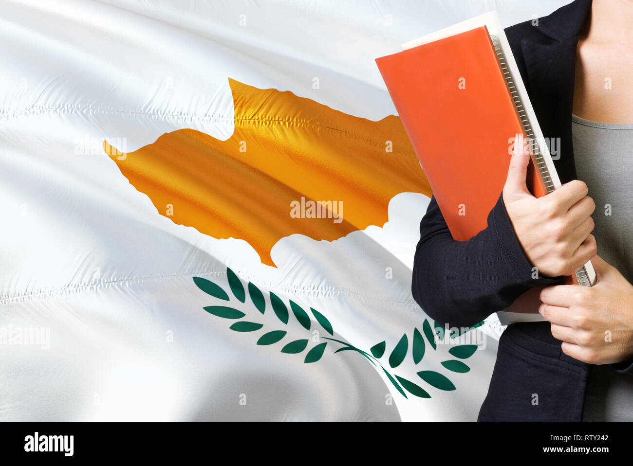 Learning Cypriot language concept. Young woman standing with the Cyprus ...