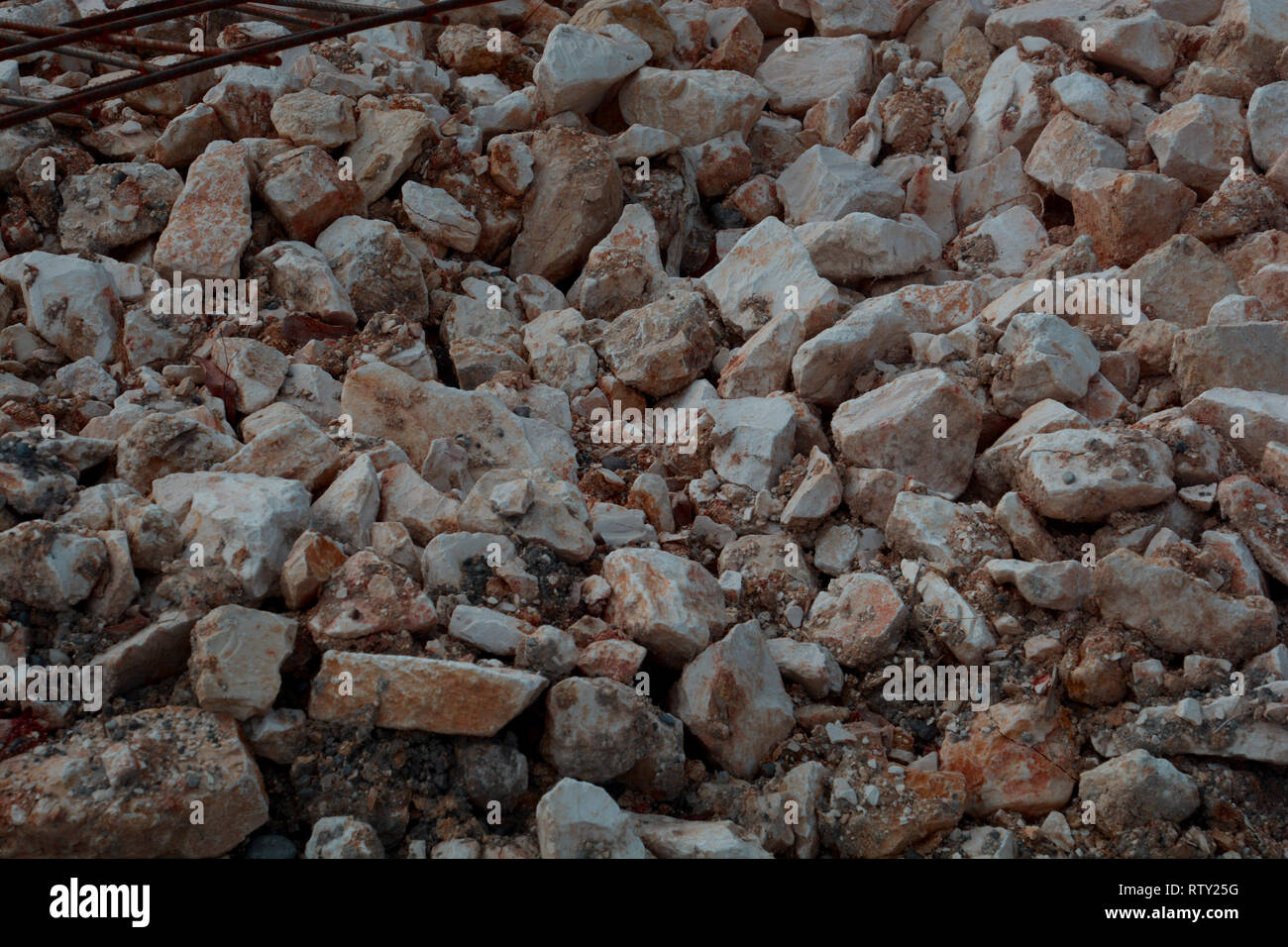 broken rock in a heap in different sizes on a construction site ...