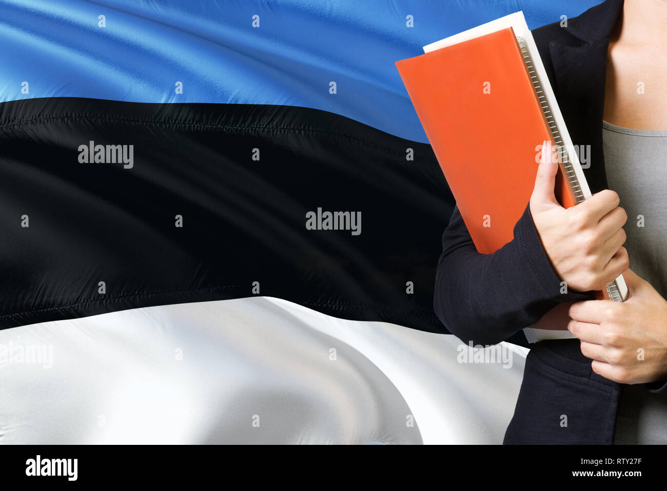 Learning Estonian language concept. Young woman standing with the ...