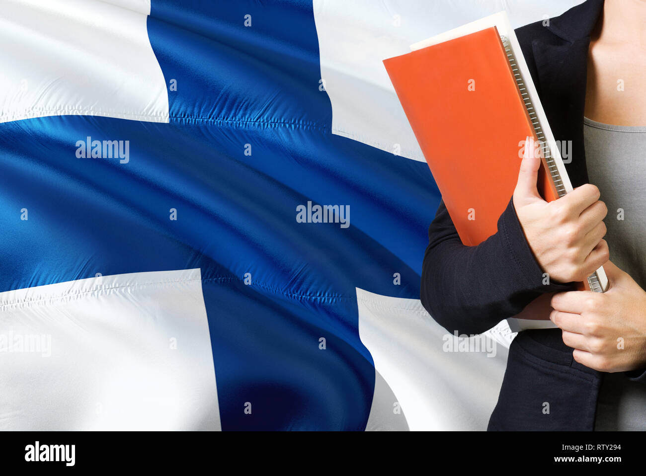 Learning Finnish language concept. Young woman standing with the ...
