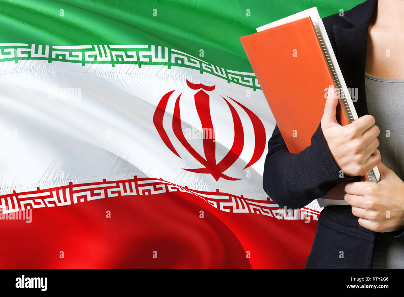 Learning Iranian language concept. Young woman standing with the Iran ...