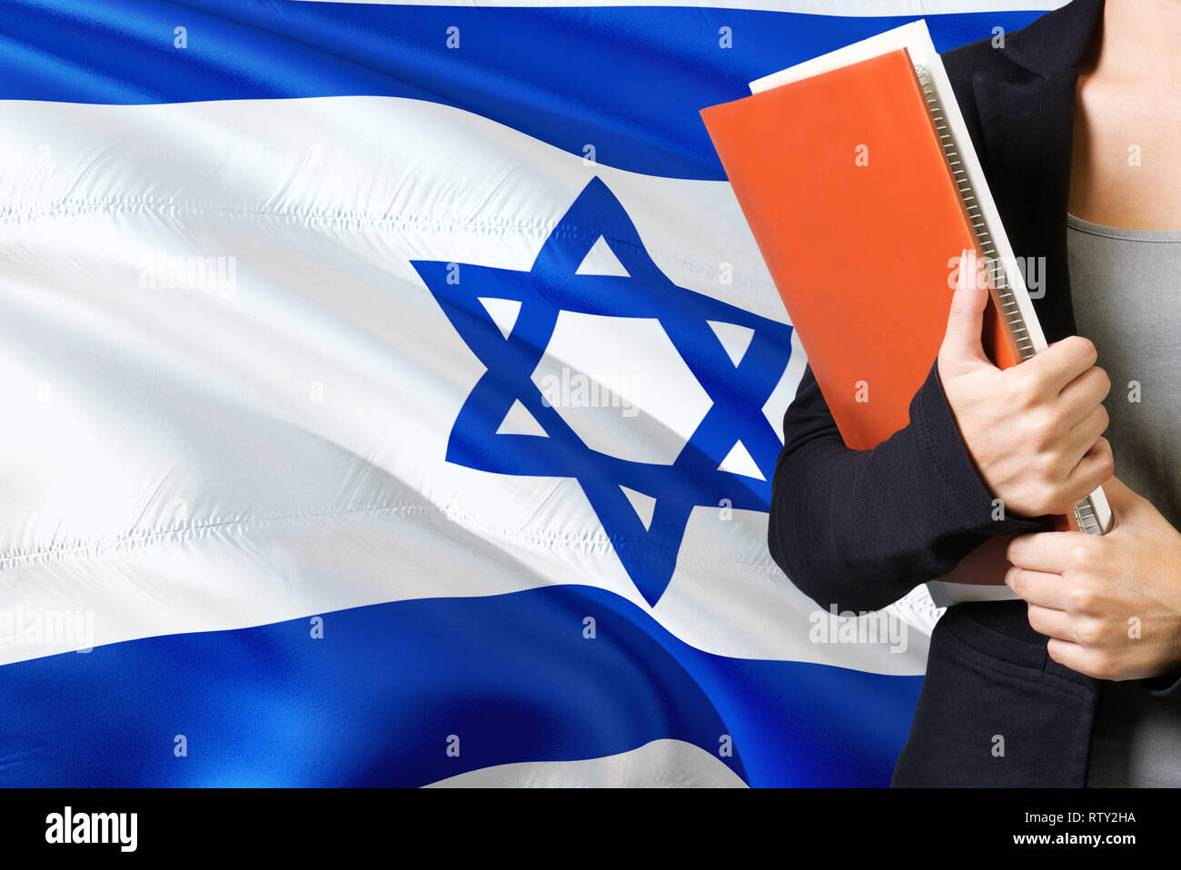 Learning Israeli language concept. Young woman standing with the Israel ...