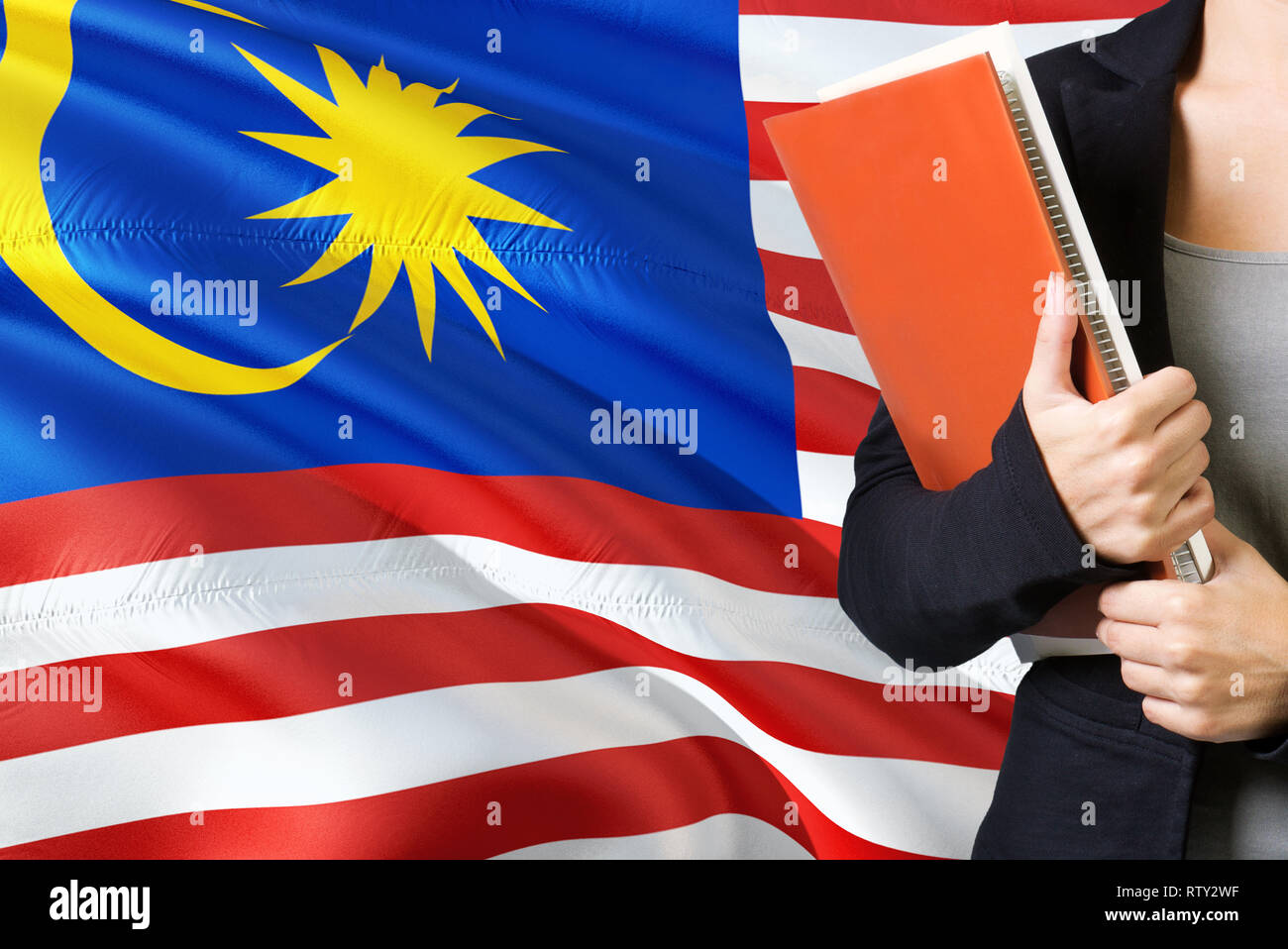 Learning Malaysian language concept. Young woman standing with the ...