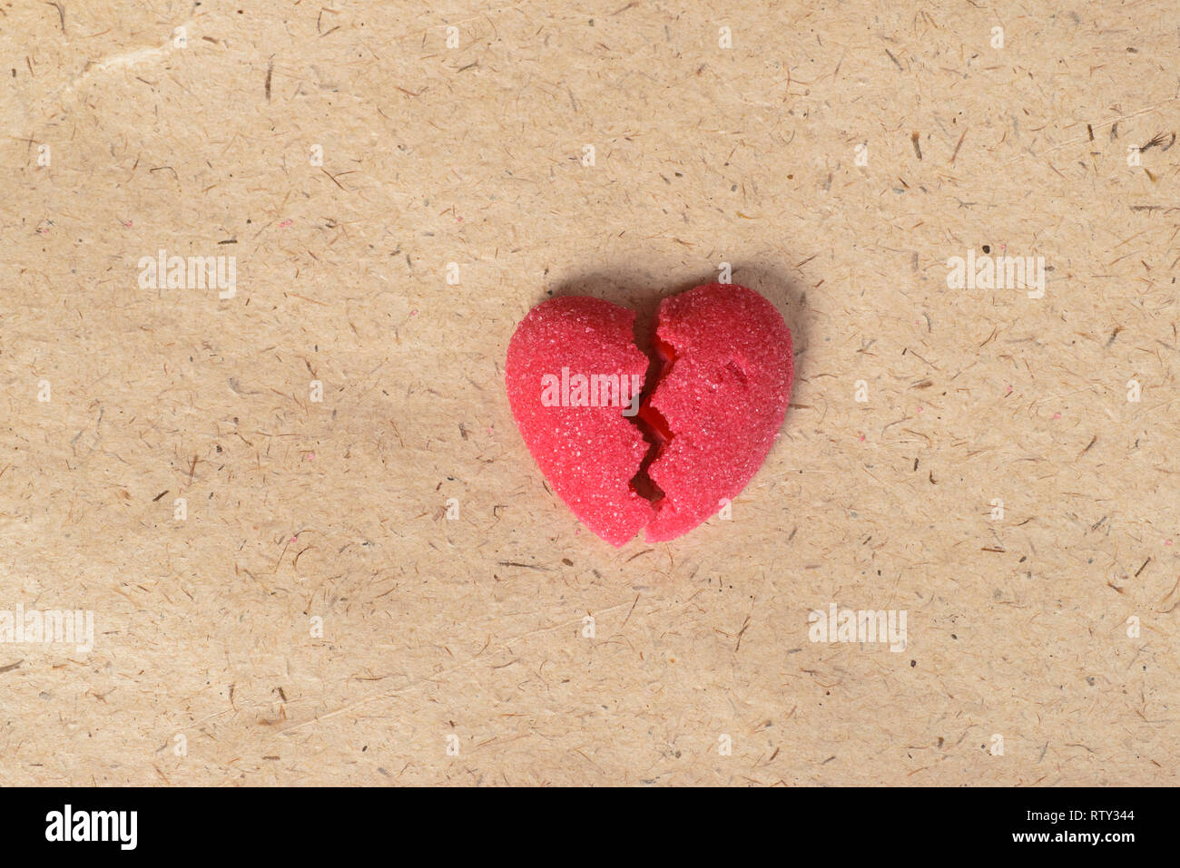 Broken heart candy hi-res stock photography and images - Alamy