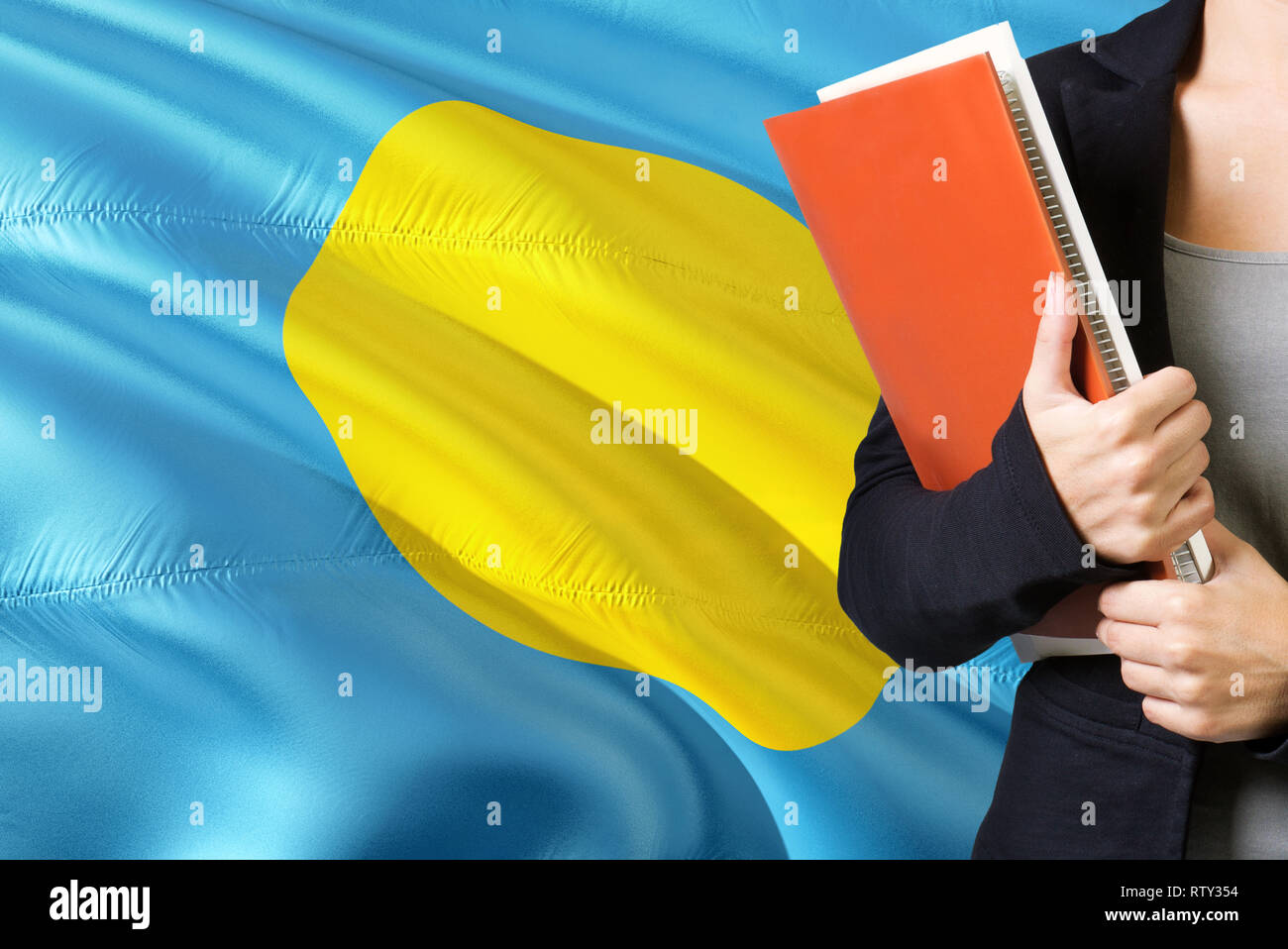 Learning Palauan language concept. Young woman standing with the Palau ...