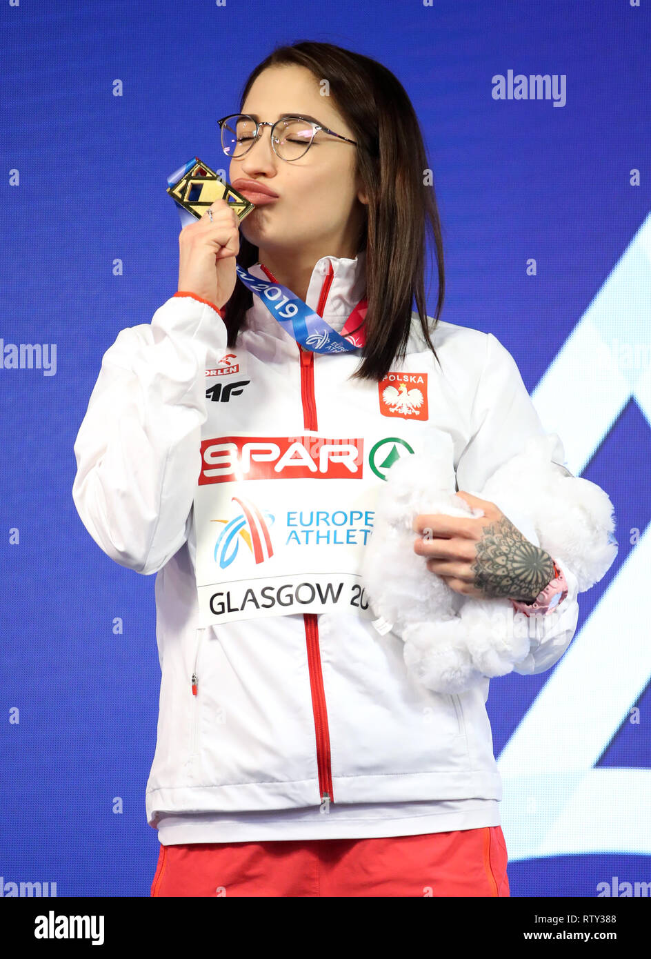 Poland's Ewa Swobada poses with her gold medal from the Women's 60 ...