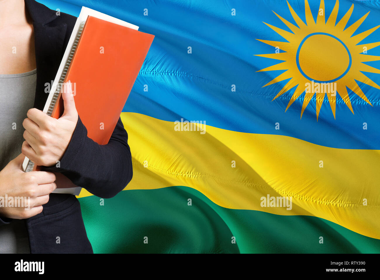 Learning Rwandan language concept. Young woman standing with the Rwanda ...