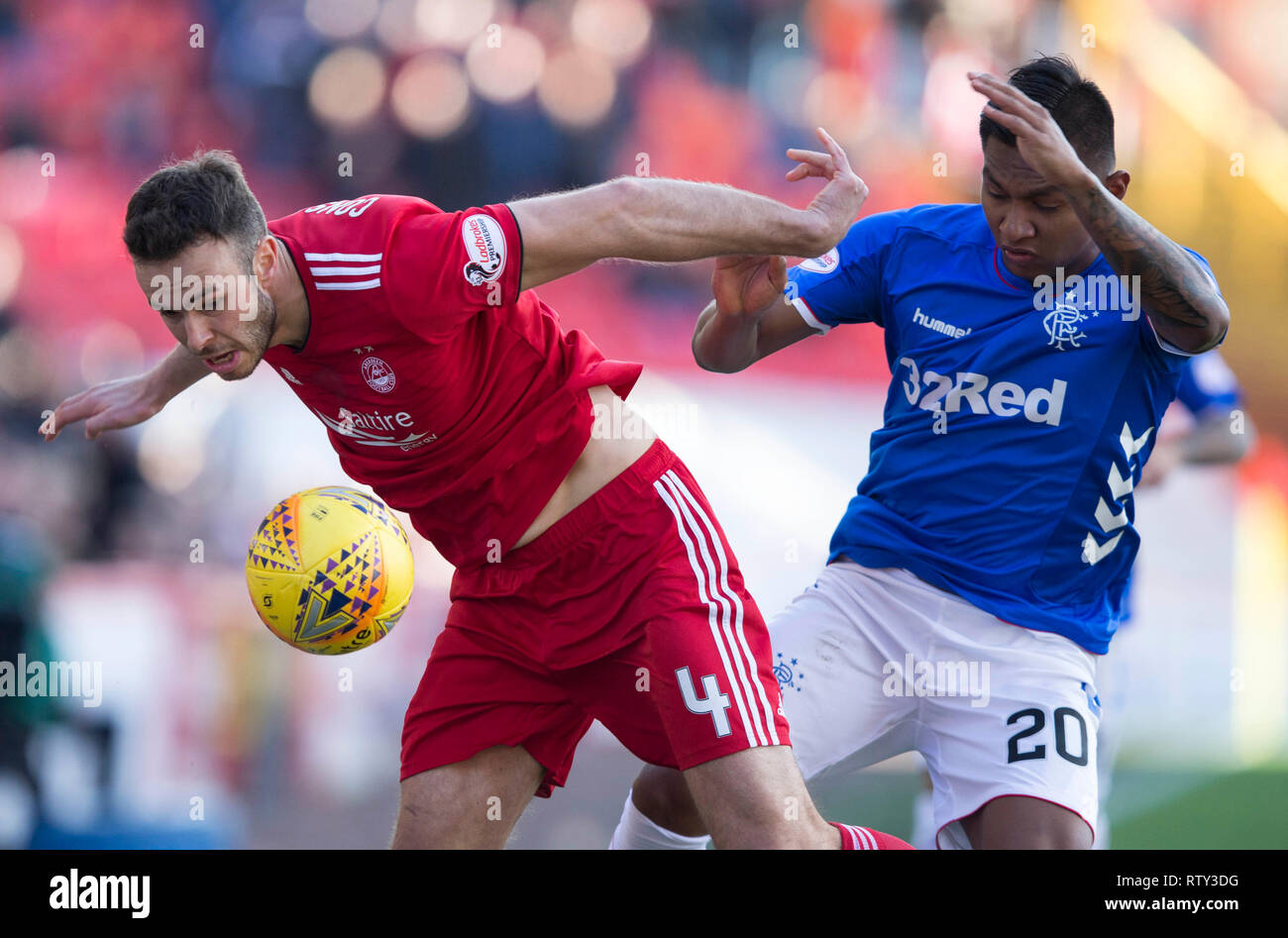 Aberdeen's Andrew Considine (left) and Rangers' Alfredo Morelos battle ...
