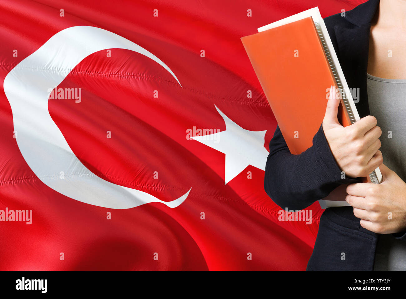Learning Turkish language concept. Young woman standing with the Turkey ...