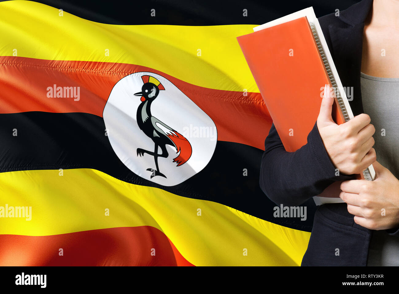 Learning Ugandan language concept. Young woman standing with the Uganda ...
