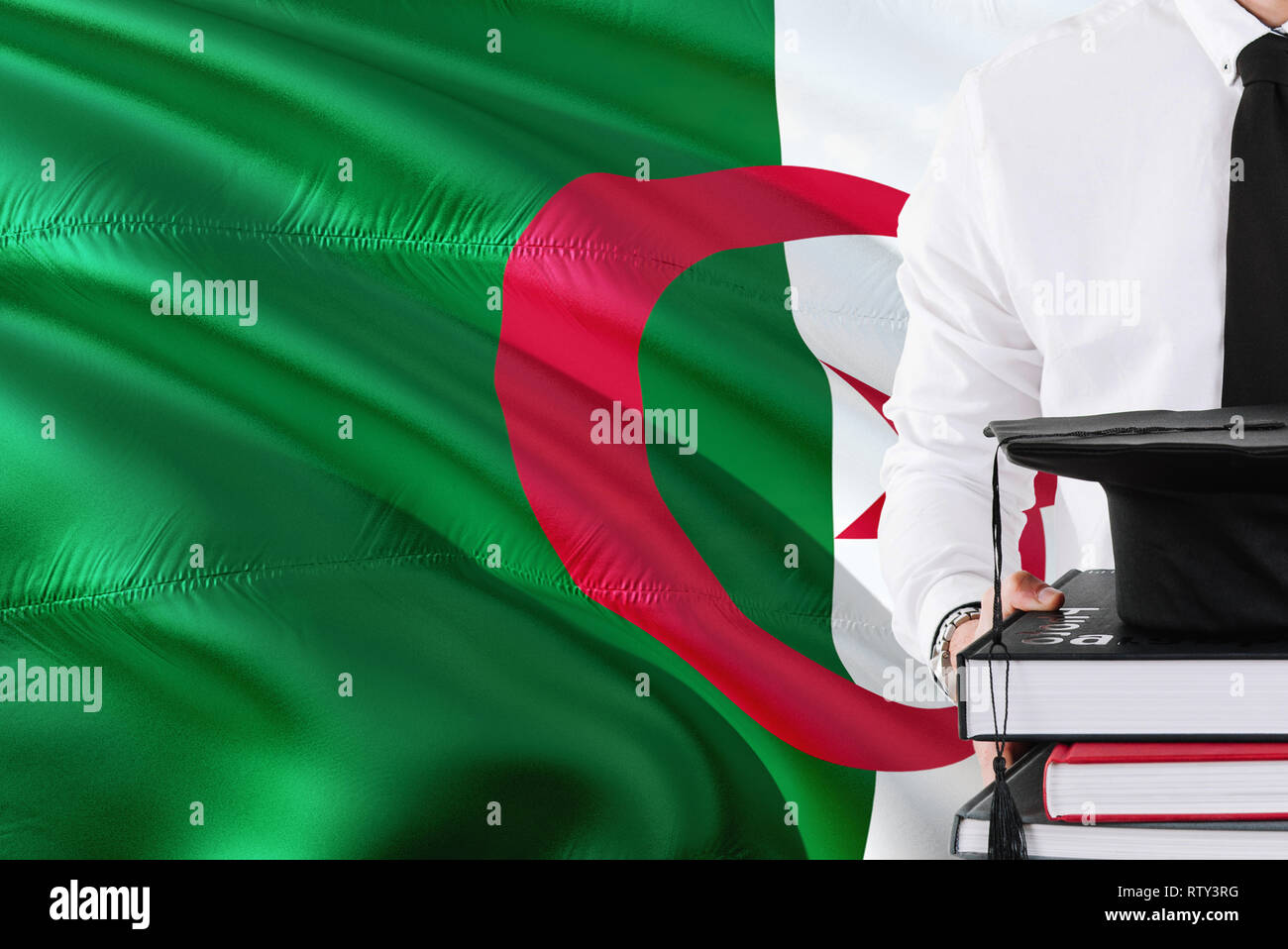 Successful Algerian student education concept. Holding books and ...