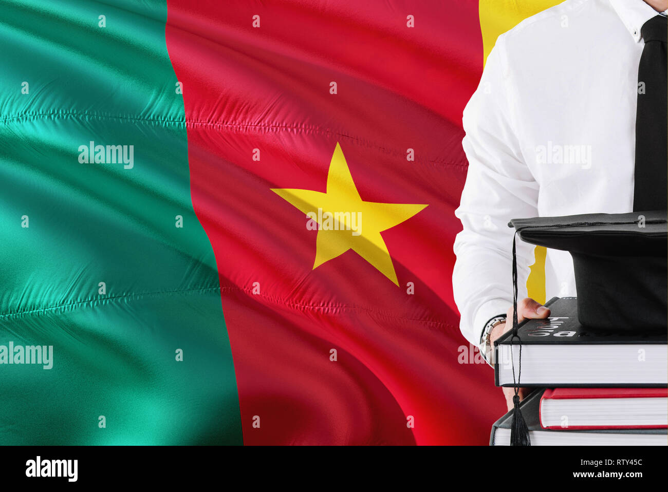 Successful Cameroonian student education concept. Holding books and ...