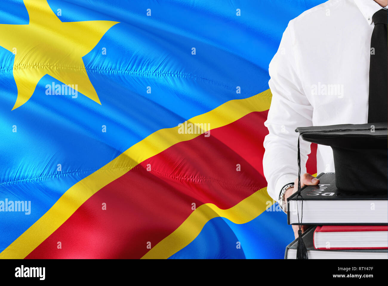 Successful Congolese student education concept. Holding books and ...