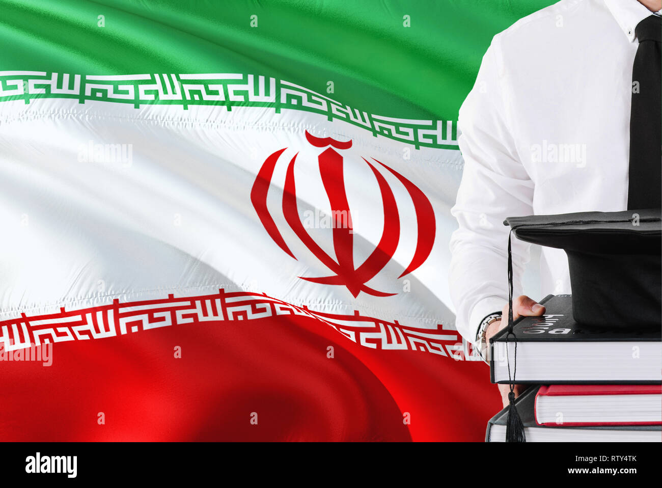 Successful Iranian student education concept. Holding books and ...