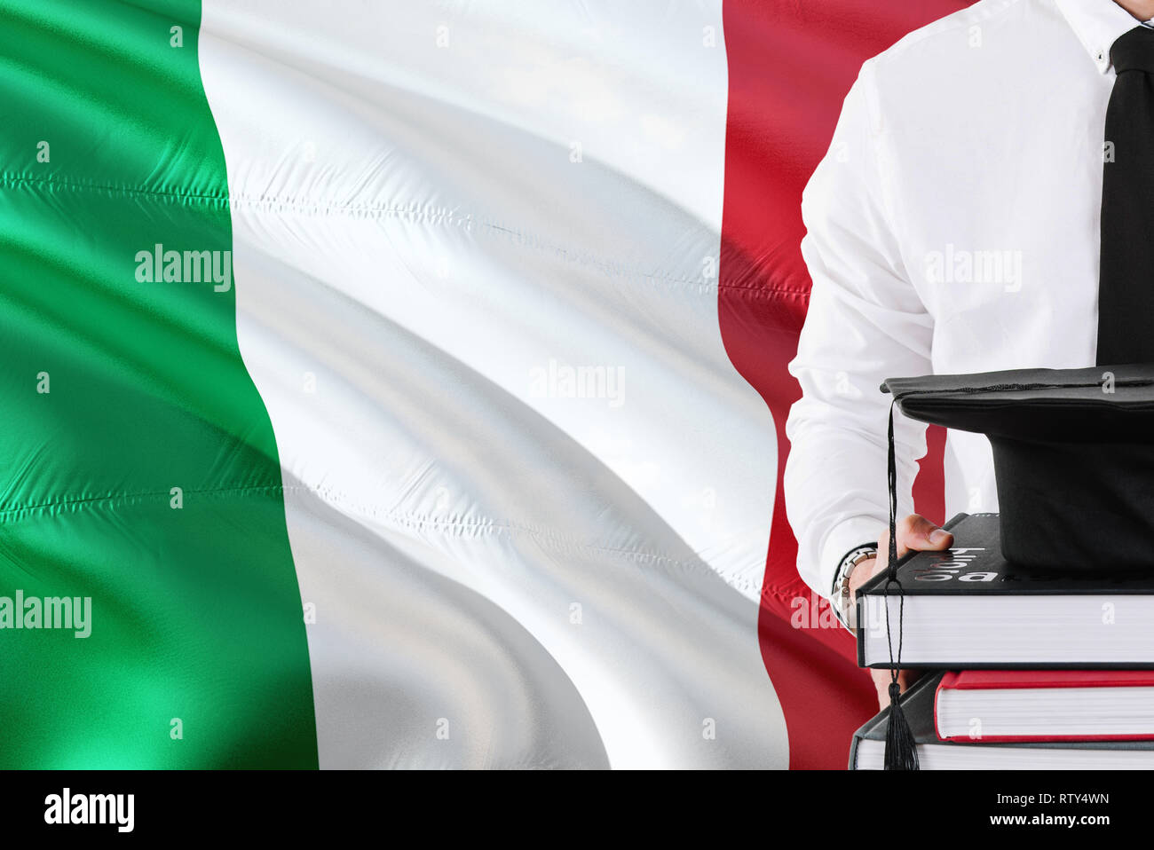 Successful Italian student education concept. Holding books and ...