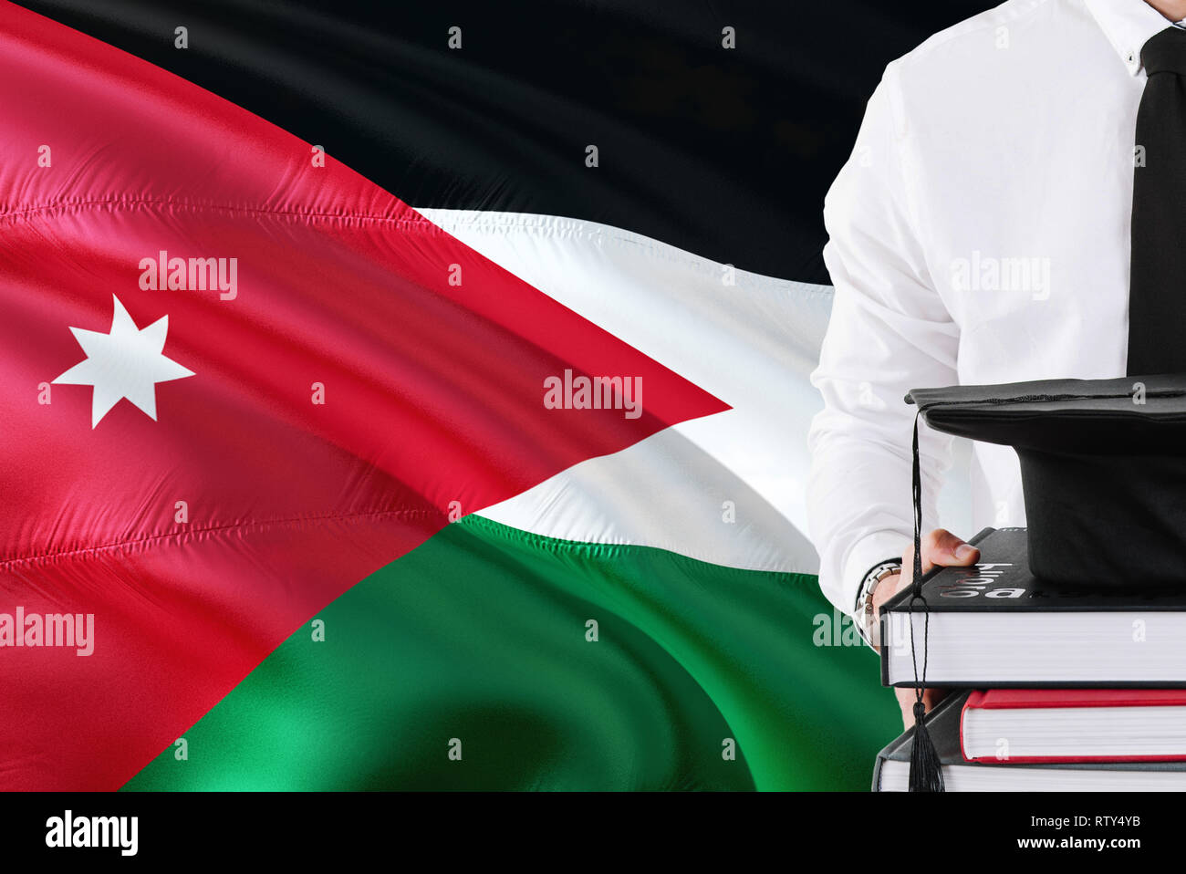 Successful Jordanian student education concept. Holding books and ...