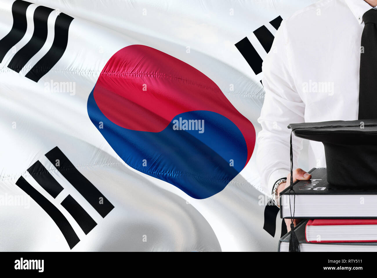 Successful South Korean student education concept. Holding books and ...