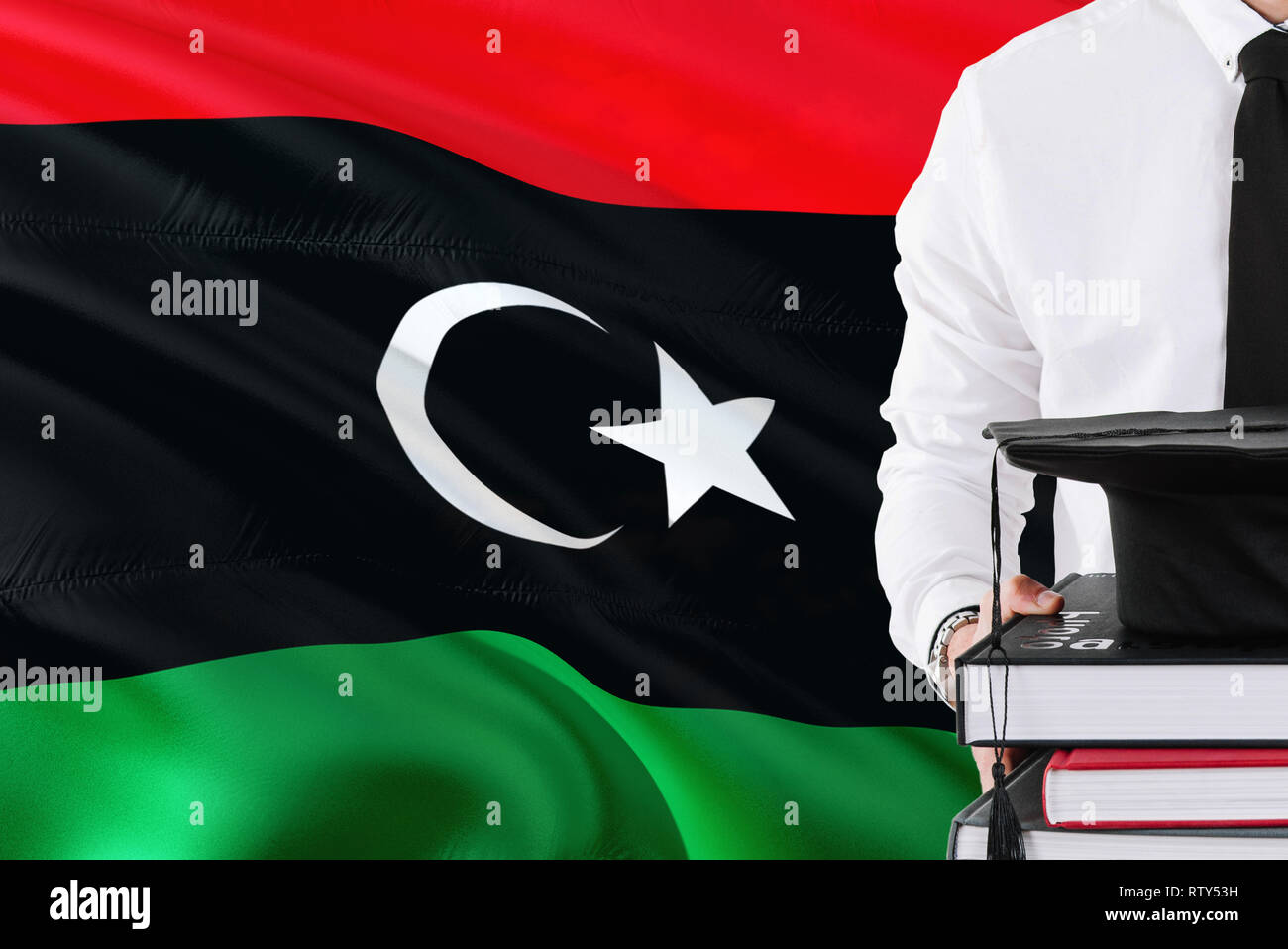 Successful Libyan student education concept. Holding books and ...
