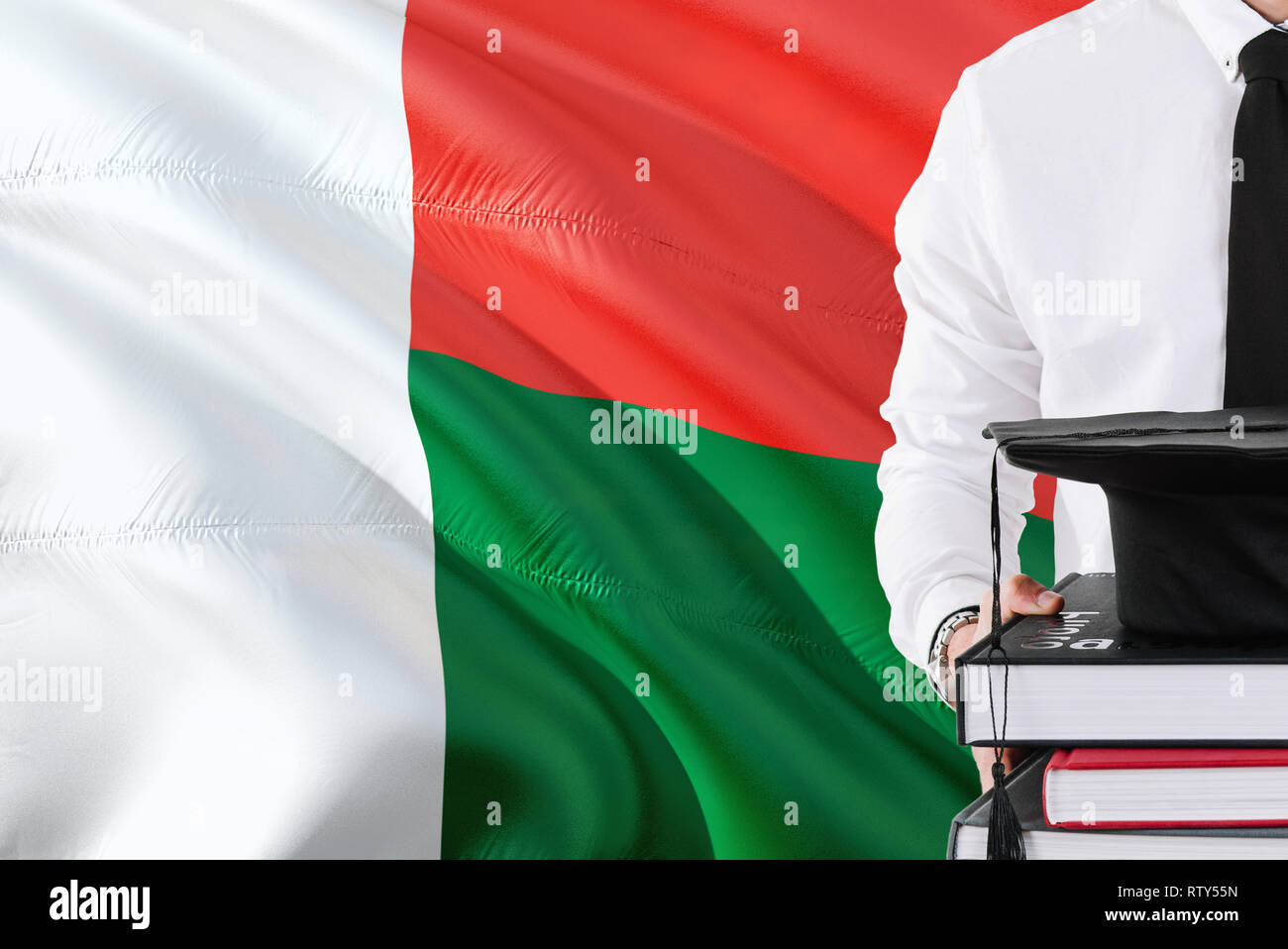 Successful Malagasy student education concept. Holding books and ...