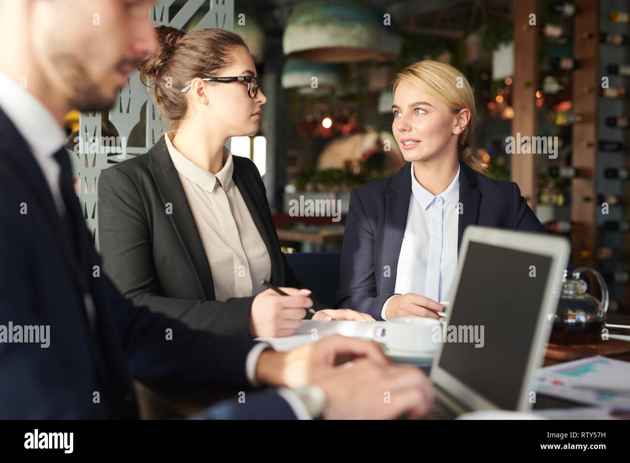 Managers organizing work Stock Photo - Alamy
