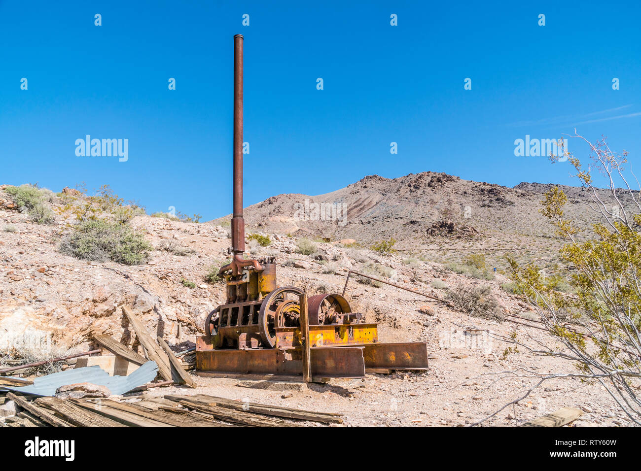 Rusted metal mining equipment at the Inyo Mine. The Inyo Mine ruins ...
