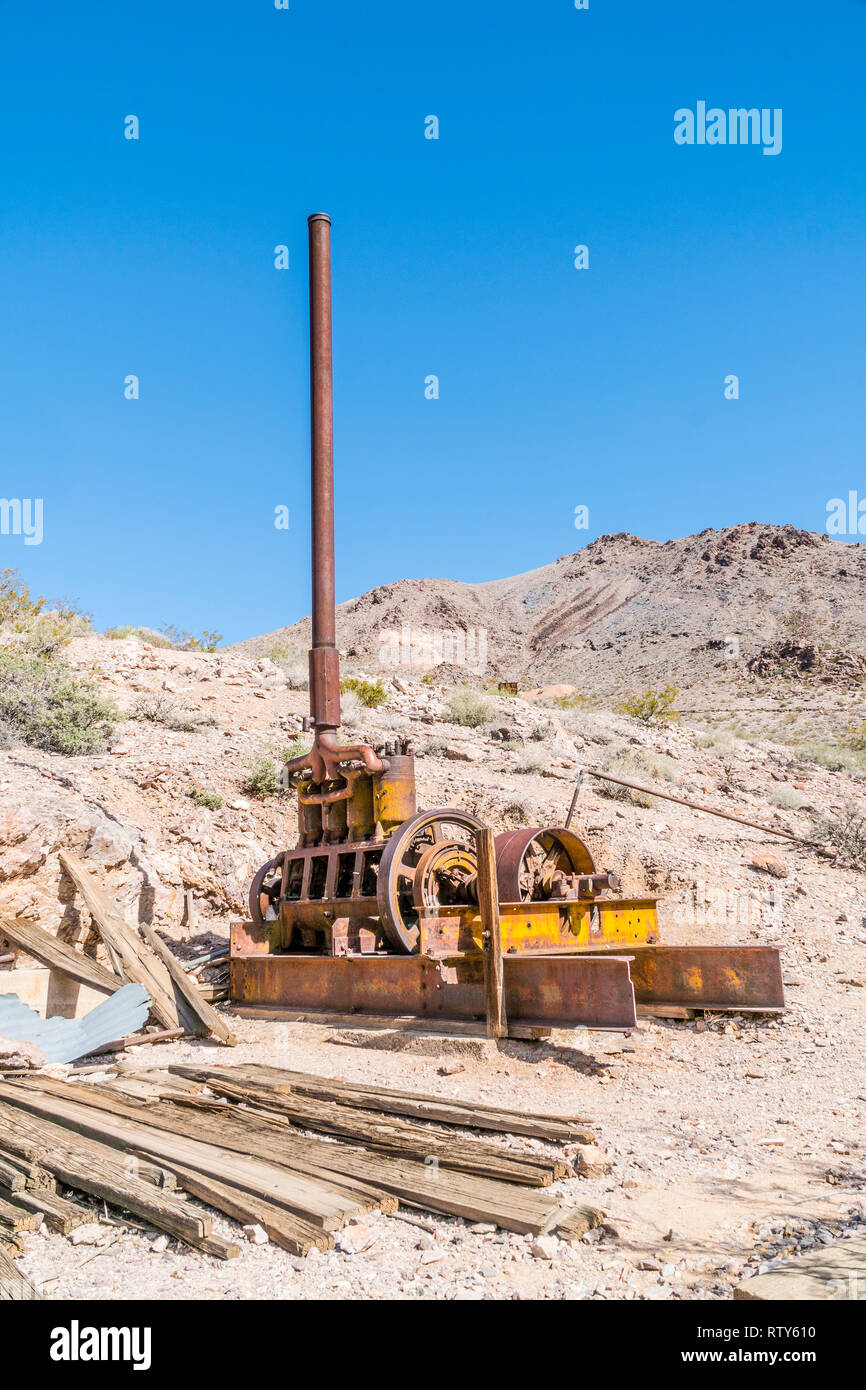 Rusted metal mining equipment at the Inyo Mine. The Inyo Mine ruins ...