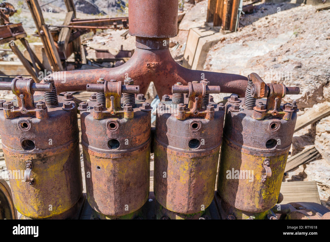 Rusted metal mining equipment at the Inyo Mine. The Inyo Mine ruins ...