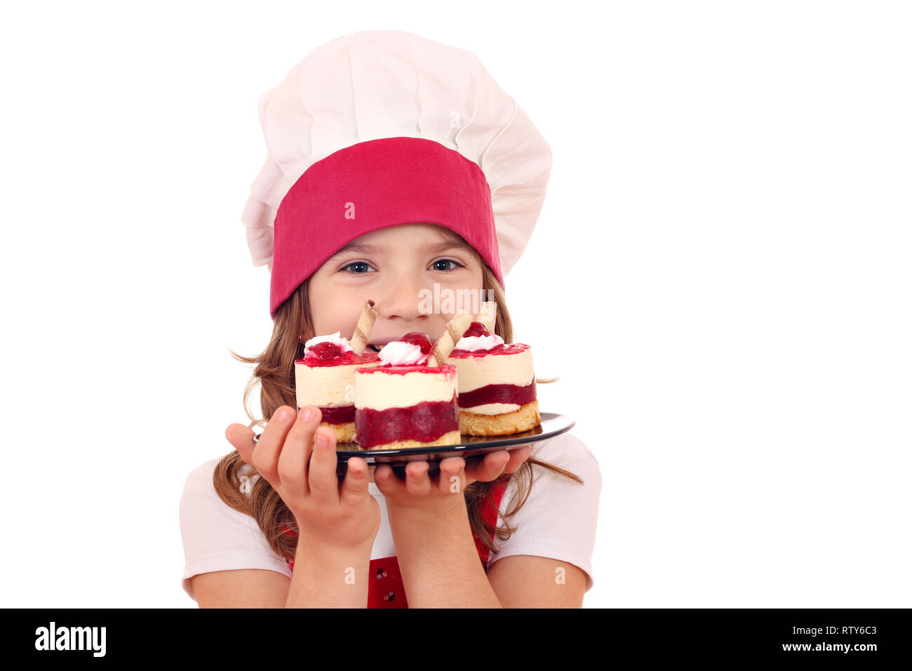 happy little girl cook with sweet raspberry cake Stock Photo - Alamy