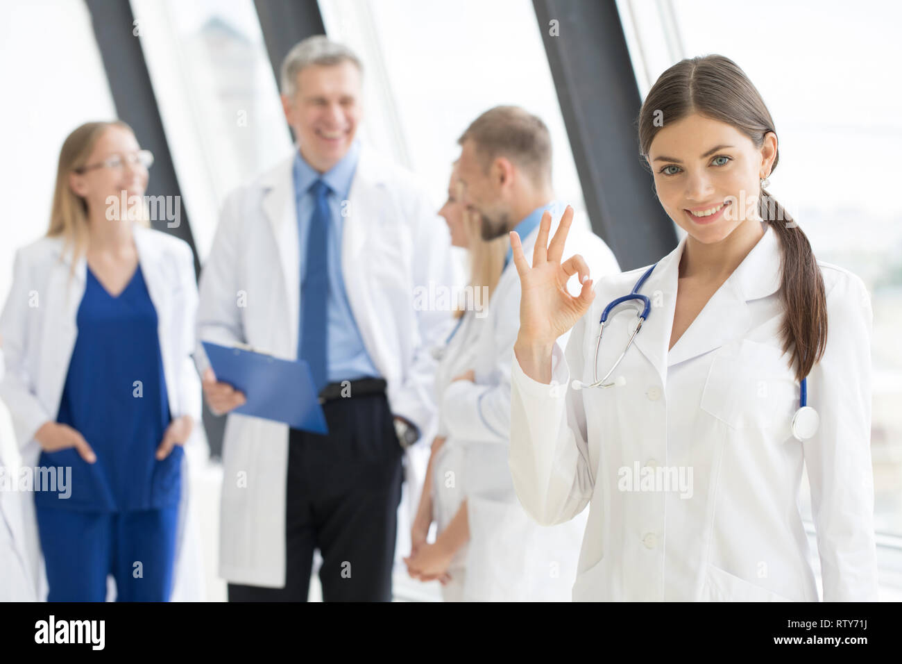 Female doctor ok sign hi-res stock photography and images - Alamy