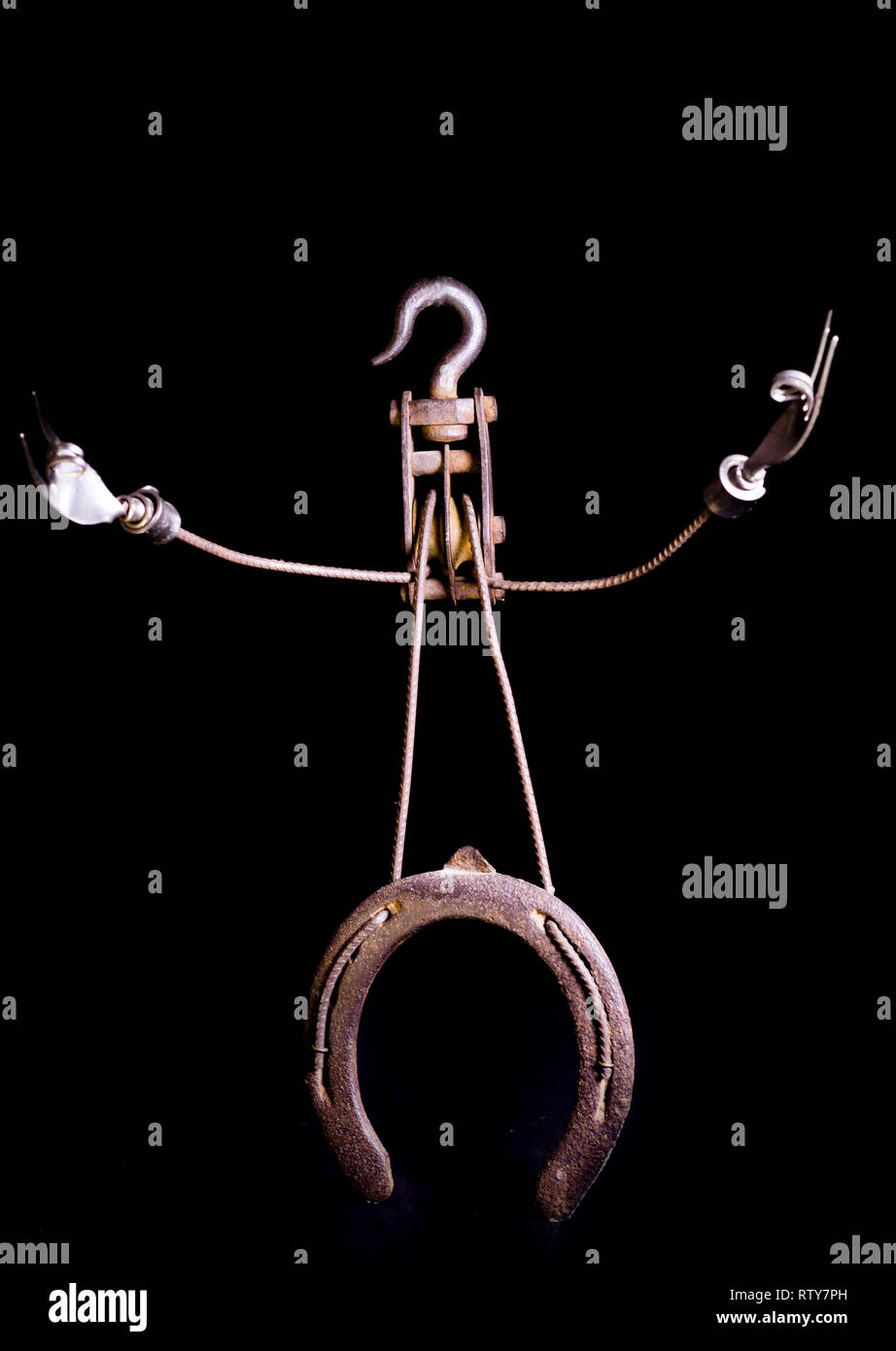 Modern sculpture made with recycled materials. Similar to human ...