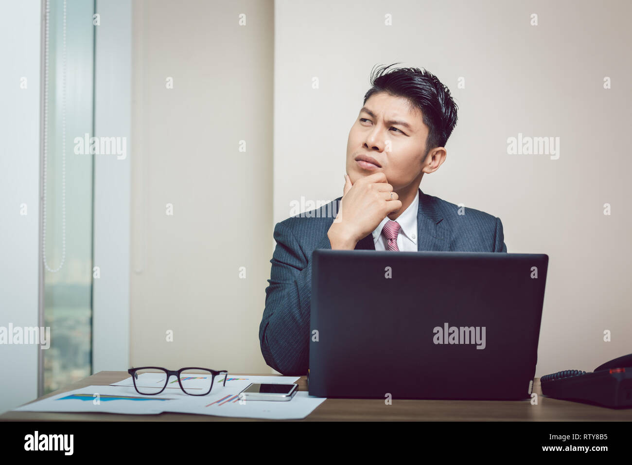 Professional think hi-res stock photography and images - Alamy
