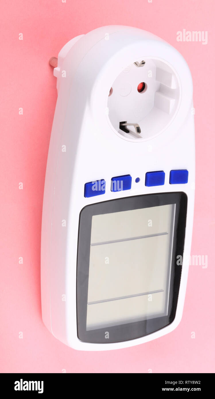 Digital Power Meter on pink background Stock Photo - Alamy